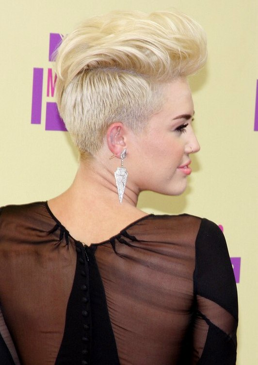 Miley Cyrus' very short hair with buzzed sides